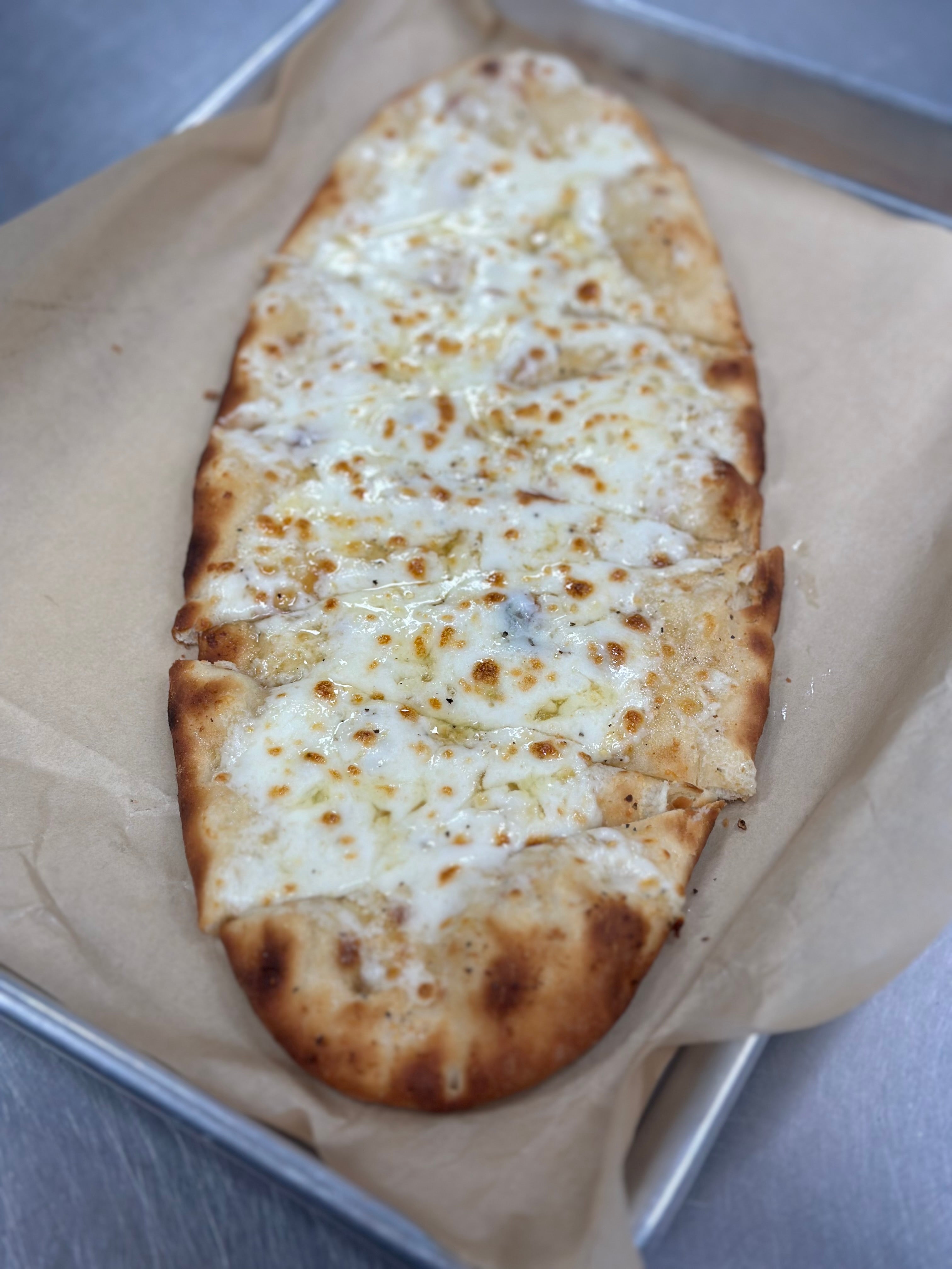 Garlic Butter & Cheese Flatbread | Canary Bar & Grill